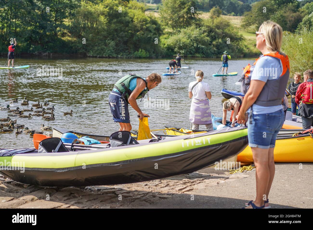 It's a Sunday and families are out on the river enjoying paddle ...