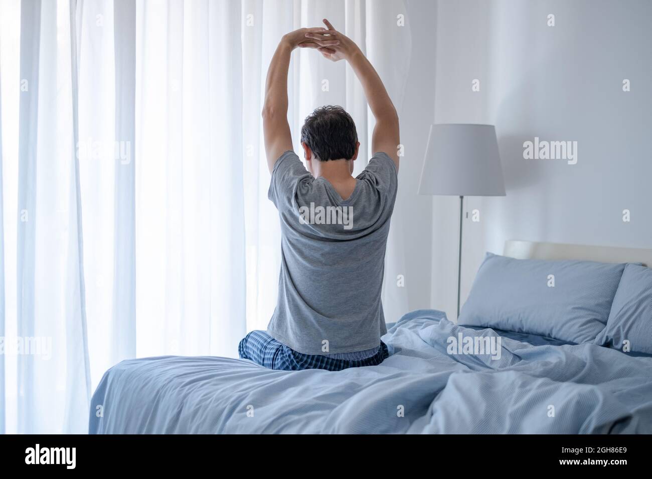Waking up fresh man hi-res stock photography and images - Alamy