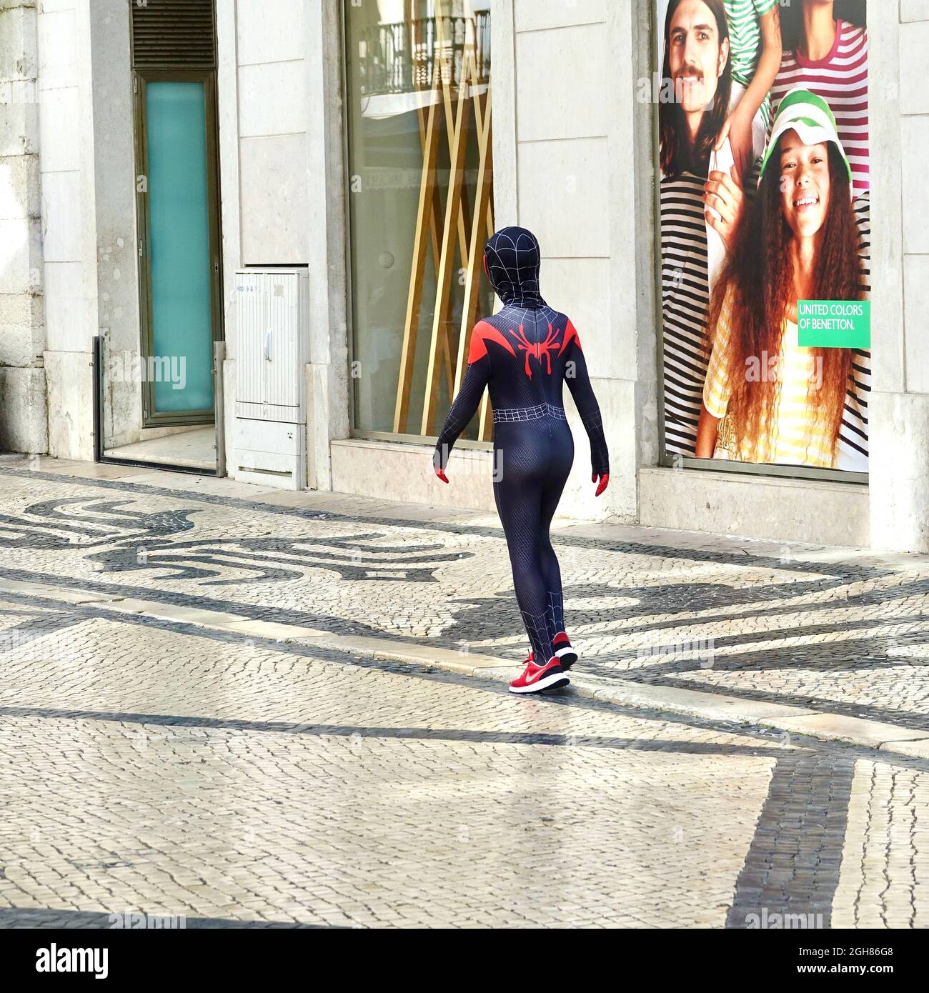 Lisbon, Portugal; September-01, 2021: Boy dressed as Spiderman walking ...