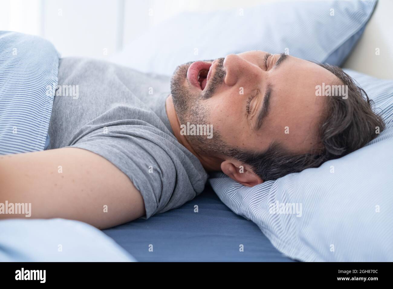 One man snore hi-res stock photography and images - Alamy