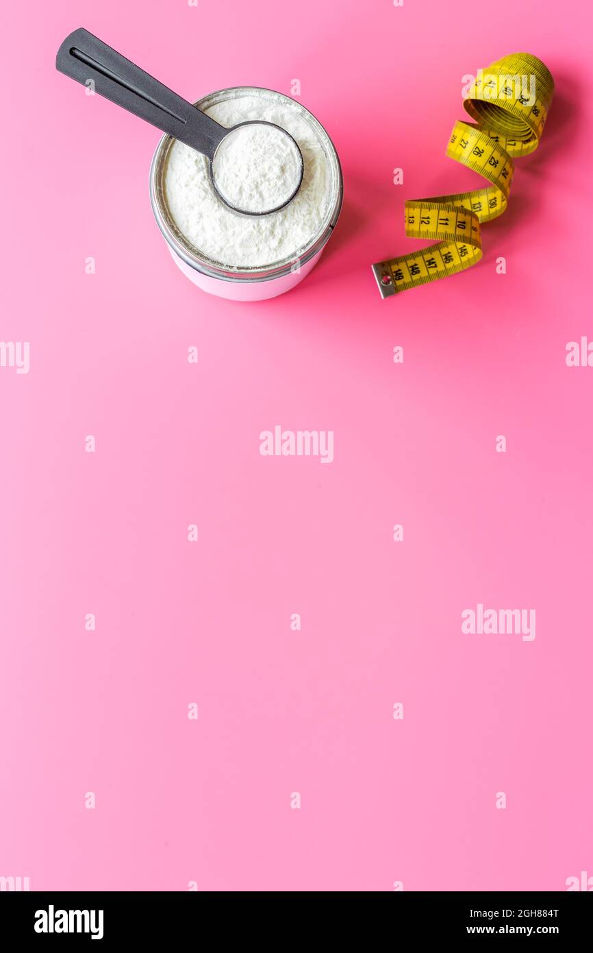 Sport nutrition - whey protein powder with tape measure. Top view Stock ...