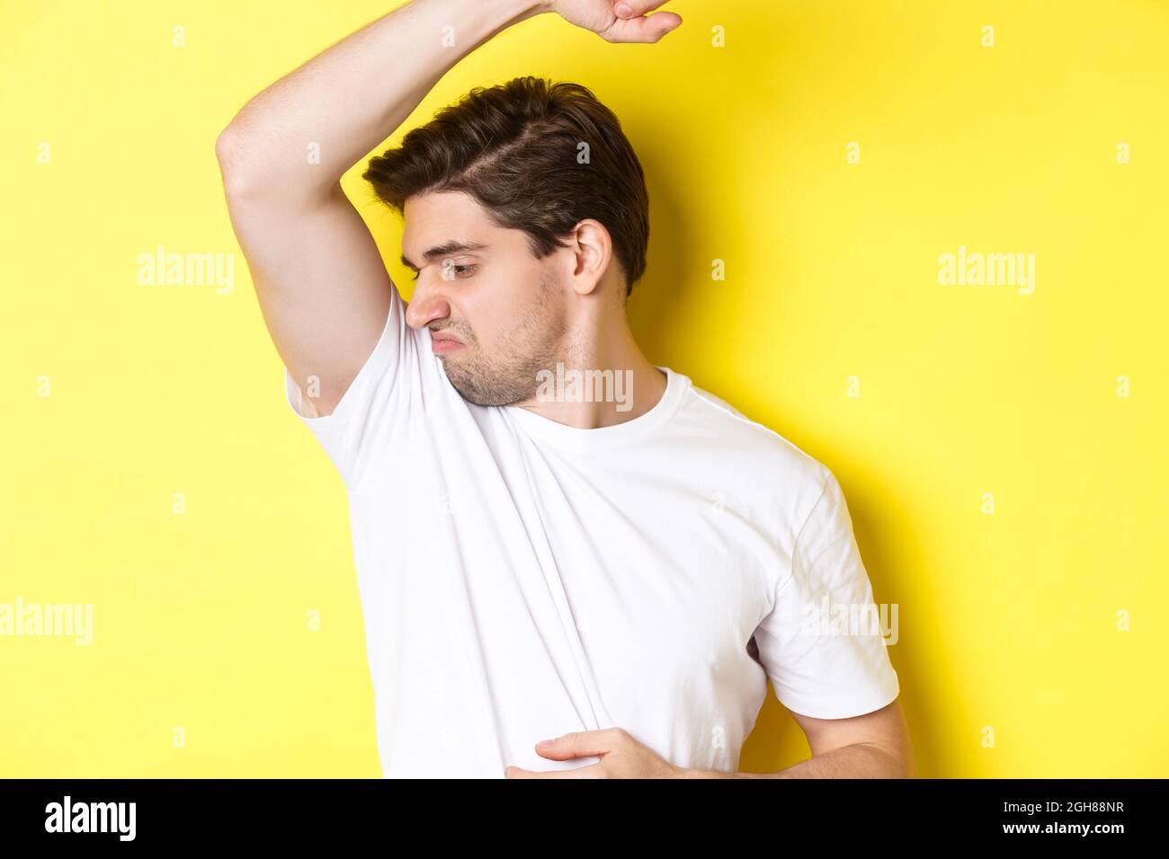 Grinning face with sweat hi-res stock photography and images - Alamy