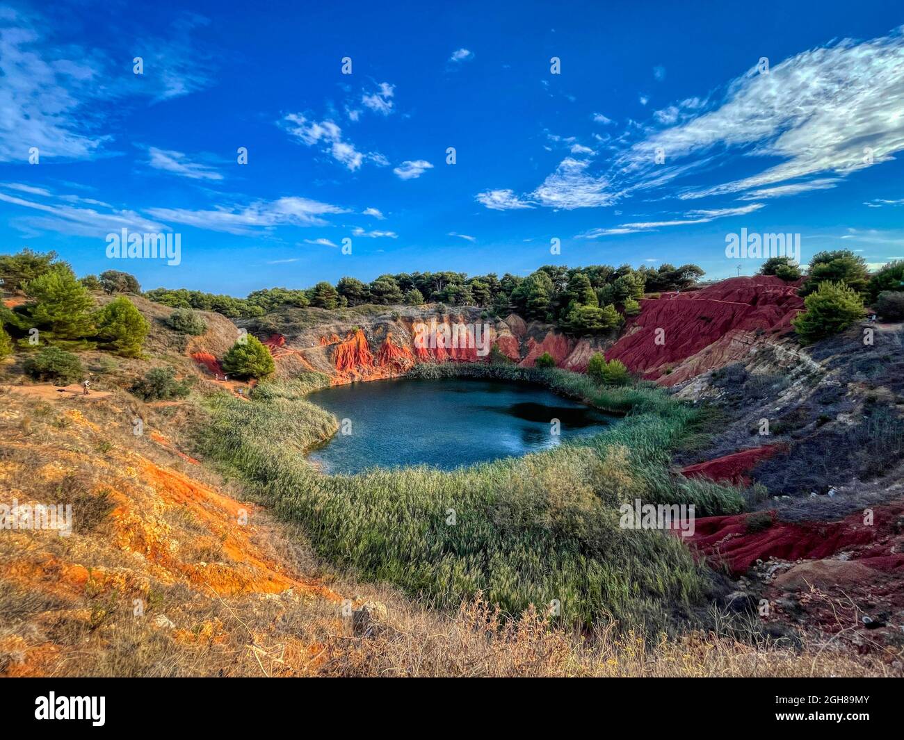 The bauxite quarry of Otranto, now abandoned. Bauxite is a mineral used ...