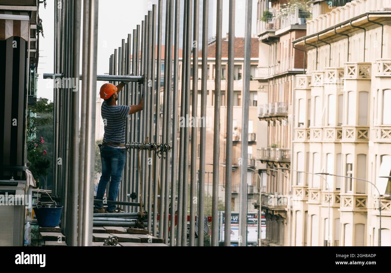 Italy Piedmont Turin building facade restoration construction work in ...