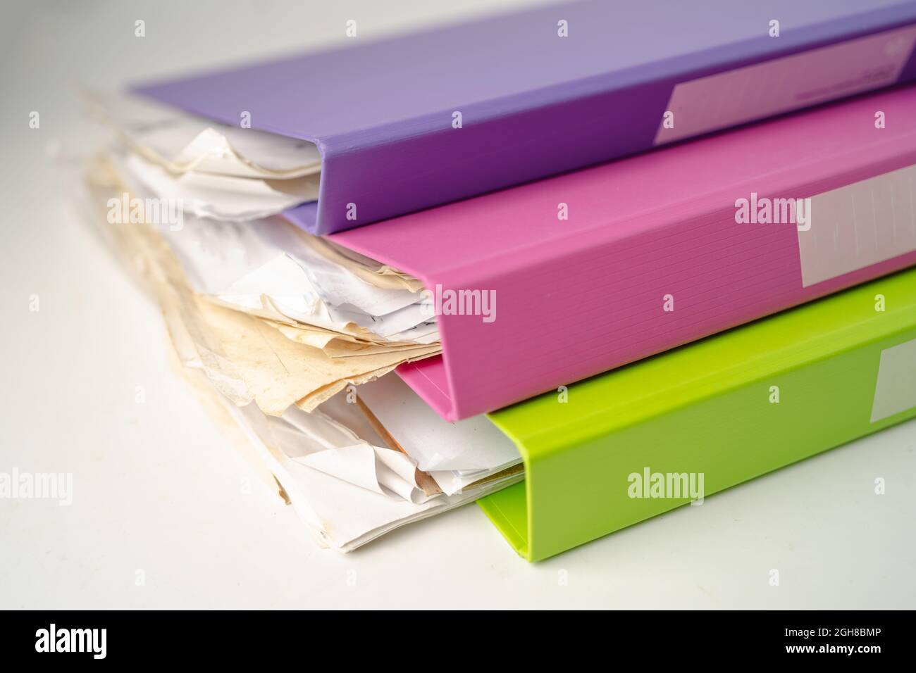 File Folder Binder stack of multi color on table in office Stock Photo ...