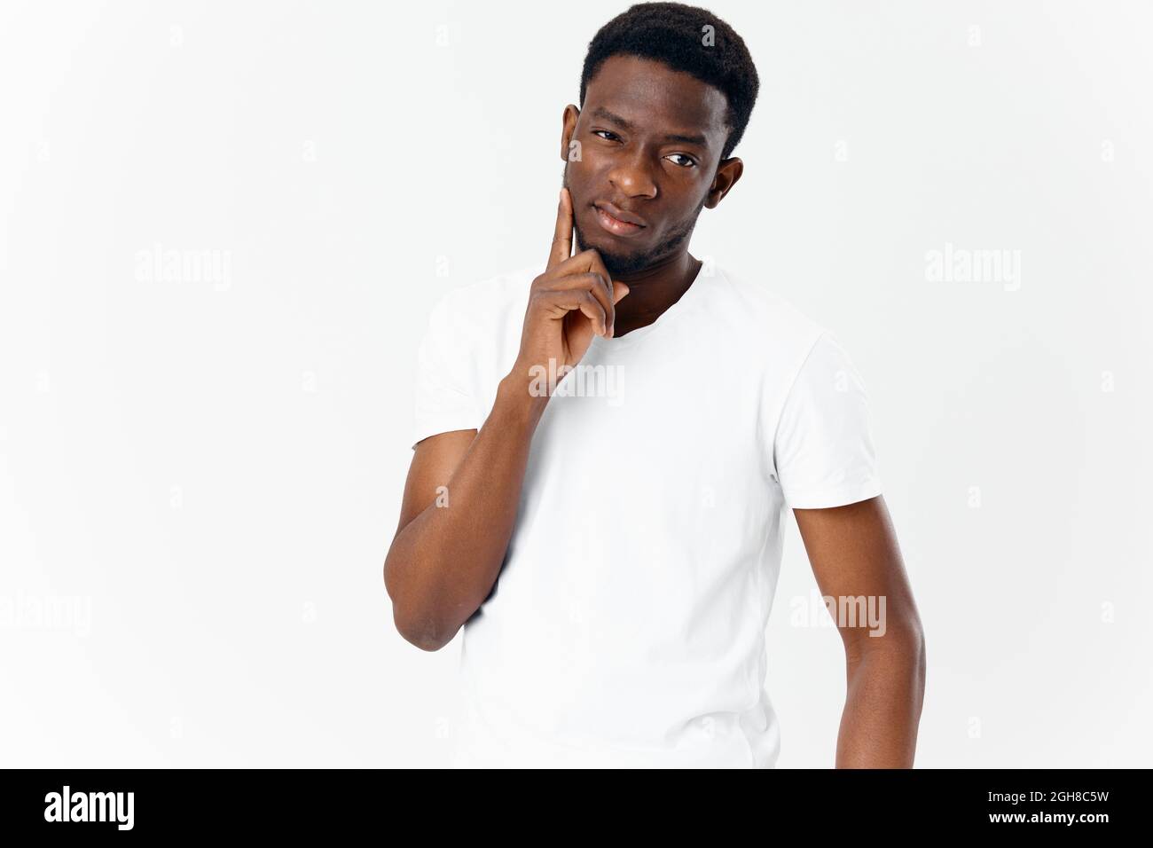 african man puzzled look light t-shirt isolated background Stock Photo ...