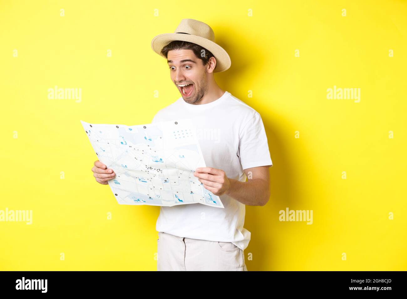 Travelling, vacation and tourism concept. Smiling happy tourist looking ...