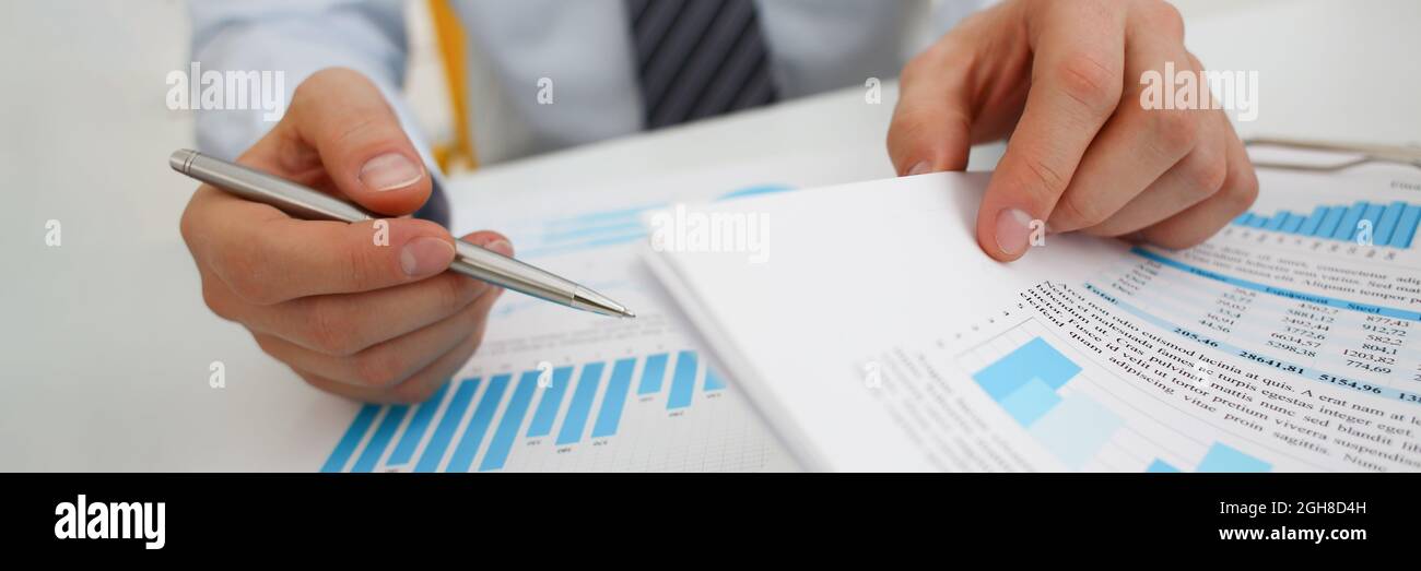 Businessman hands holding hand and commercial business charts Stock ...