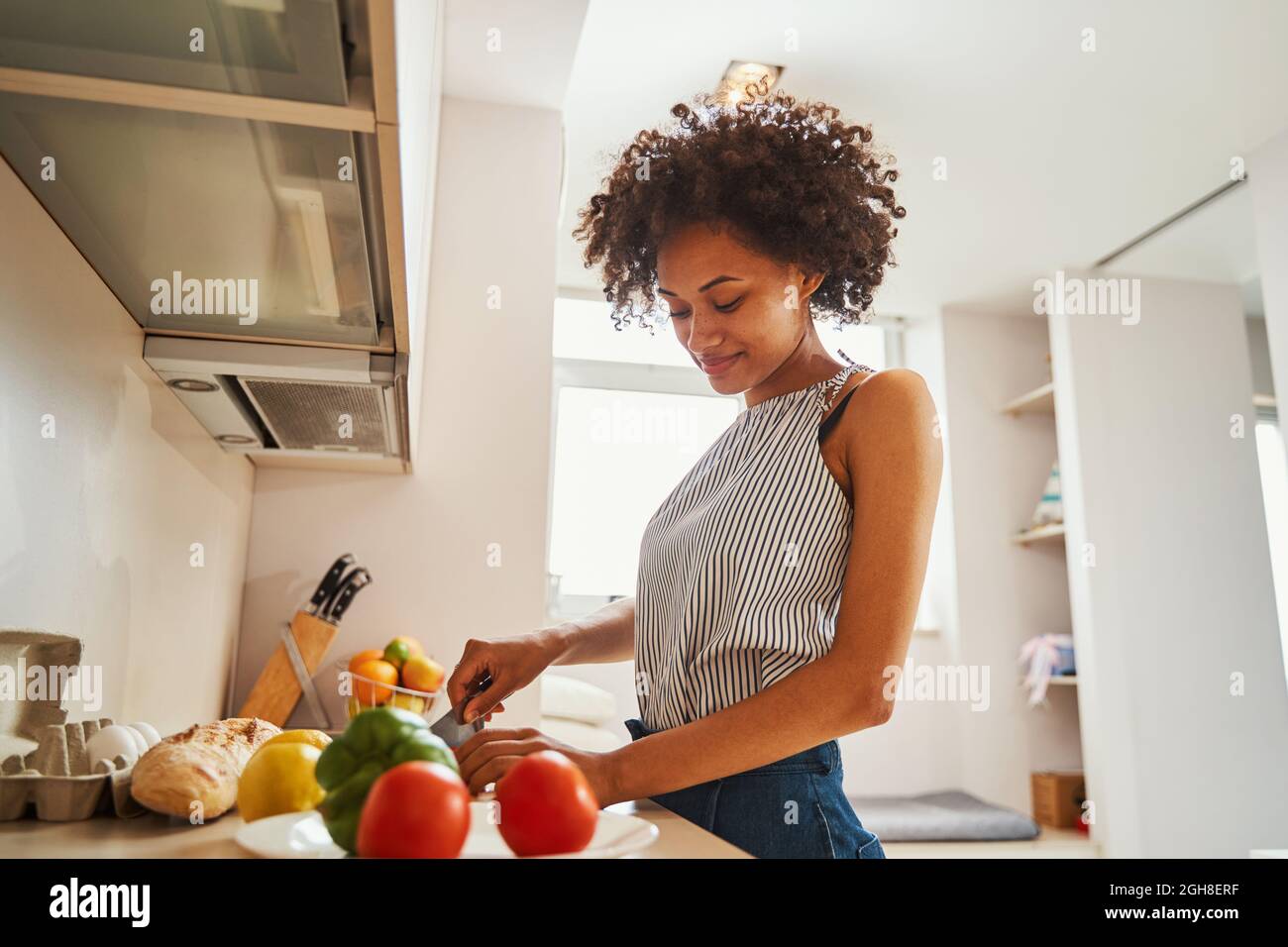 Beautiful dark skinned woman making hi-res stock photography and images ...