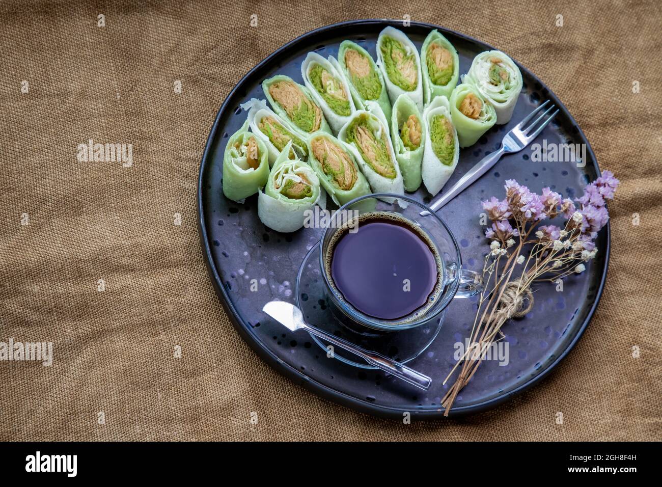 Afternoon tea set. Roti Sai Mai is name of Thai cotton candy wrapped ...