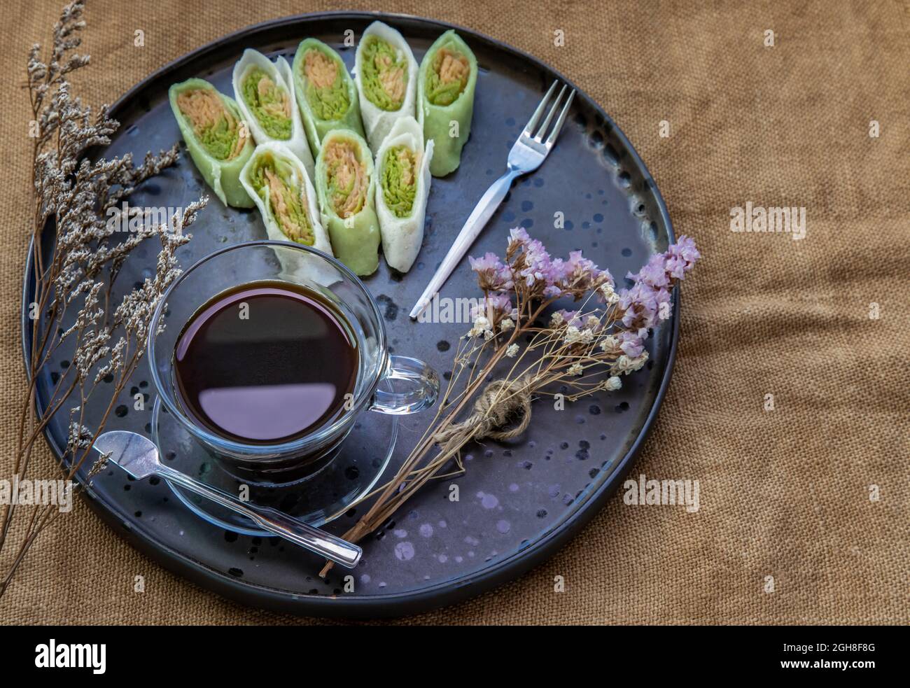 Afternoon tea set. Roti Sai Mai is name of Thai cotton candy wrapped ...