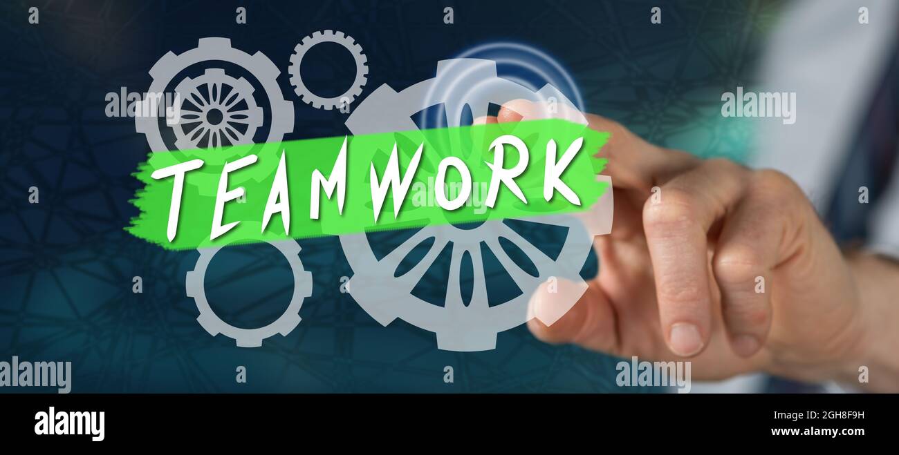 Man touching a teamwork concept on a touch screen with his finger Stock ...