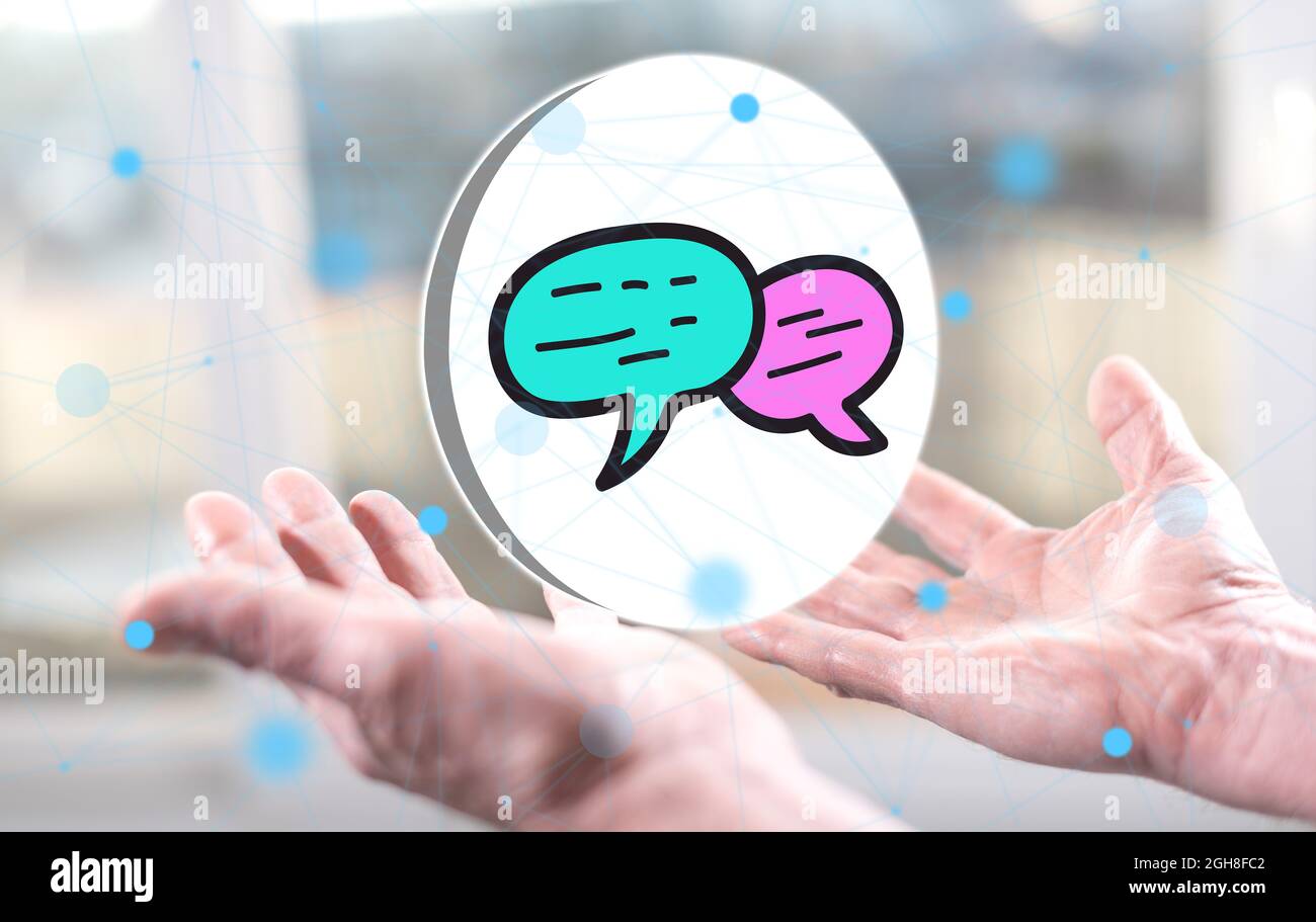Communication concept above the hands of a man Stock Photo - Alamy