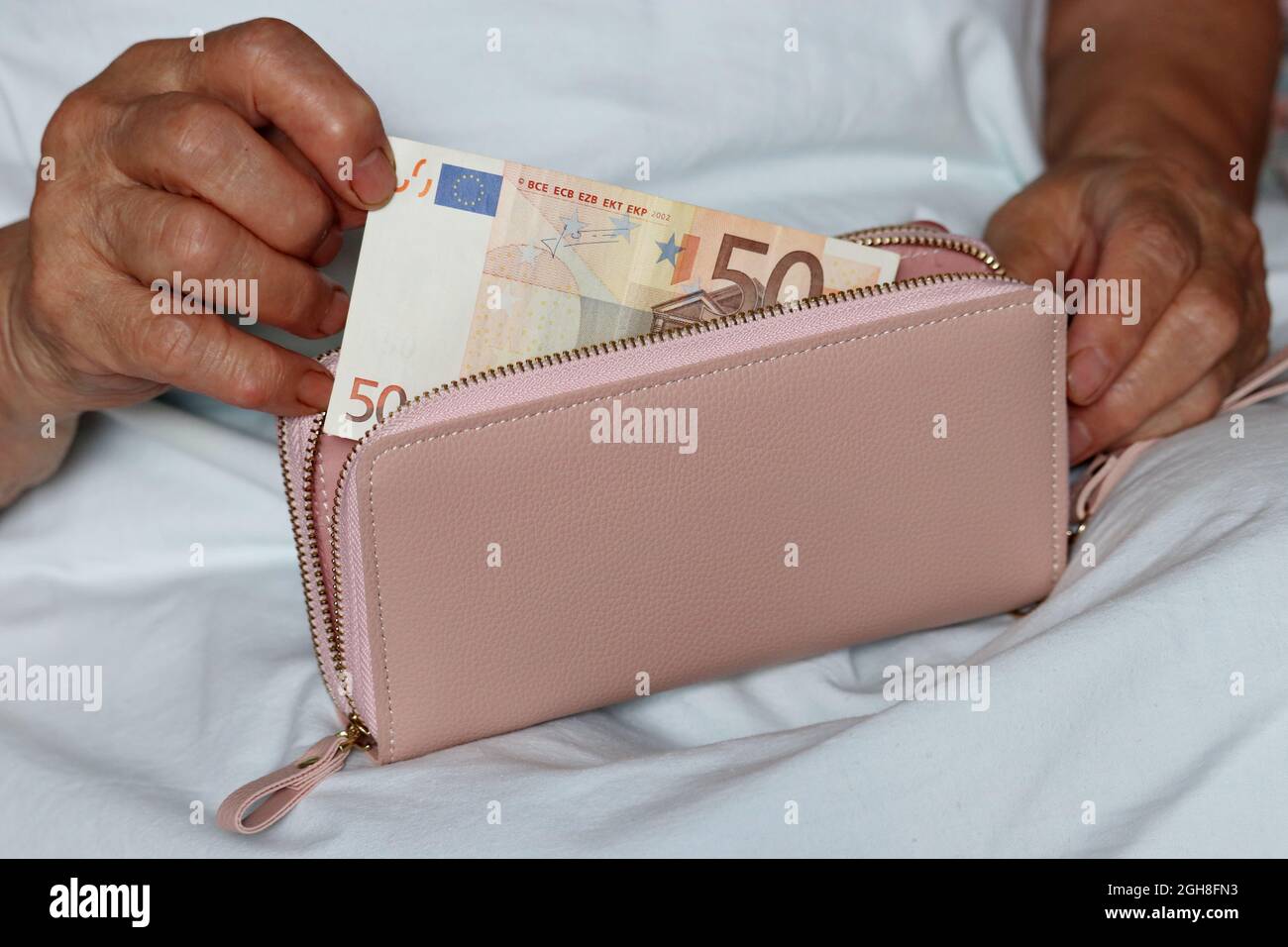 Elderly woman bed hi-res stock photography and images - Alamy