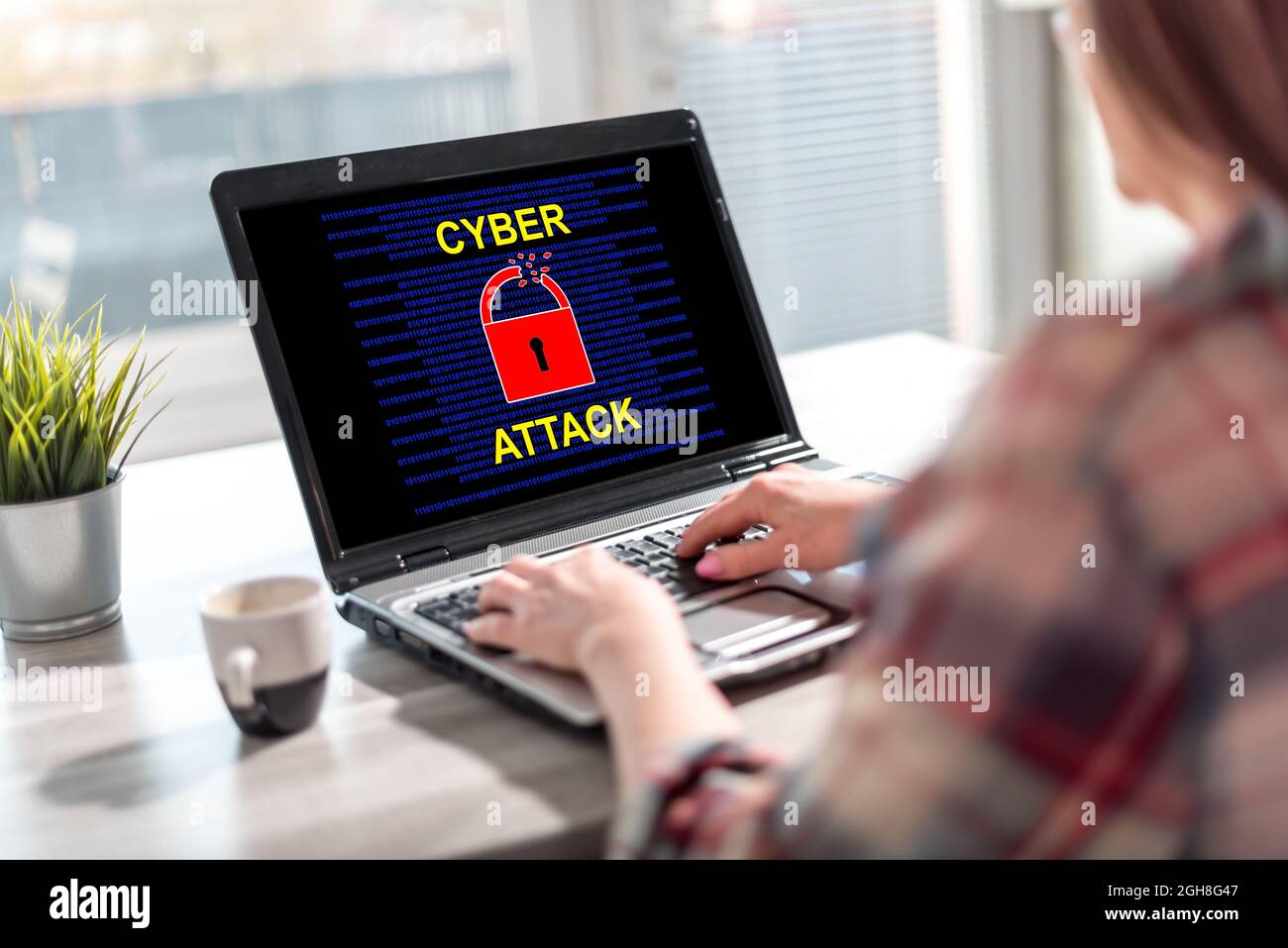 Laptop screen displaying a cyber attack concept Stock Photo - Alamy