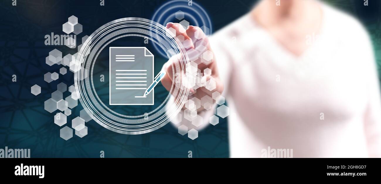 Woman touching a smart contract concept on a touch screen with her ...