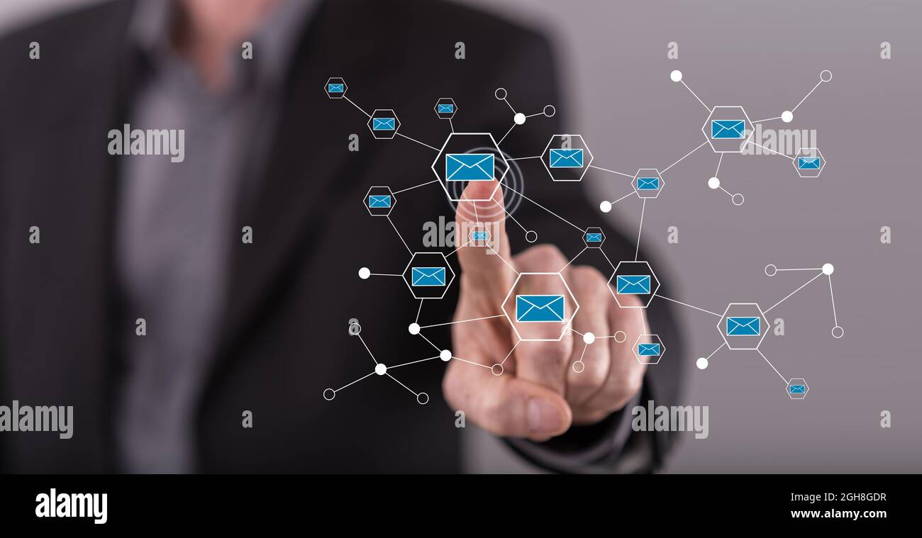 Man touching a communication network on a touch screen with his finger ...