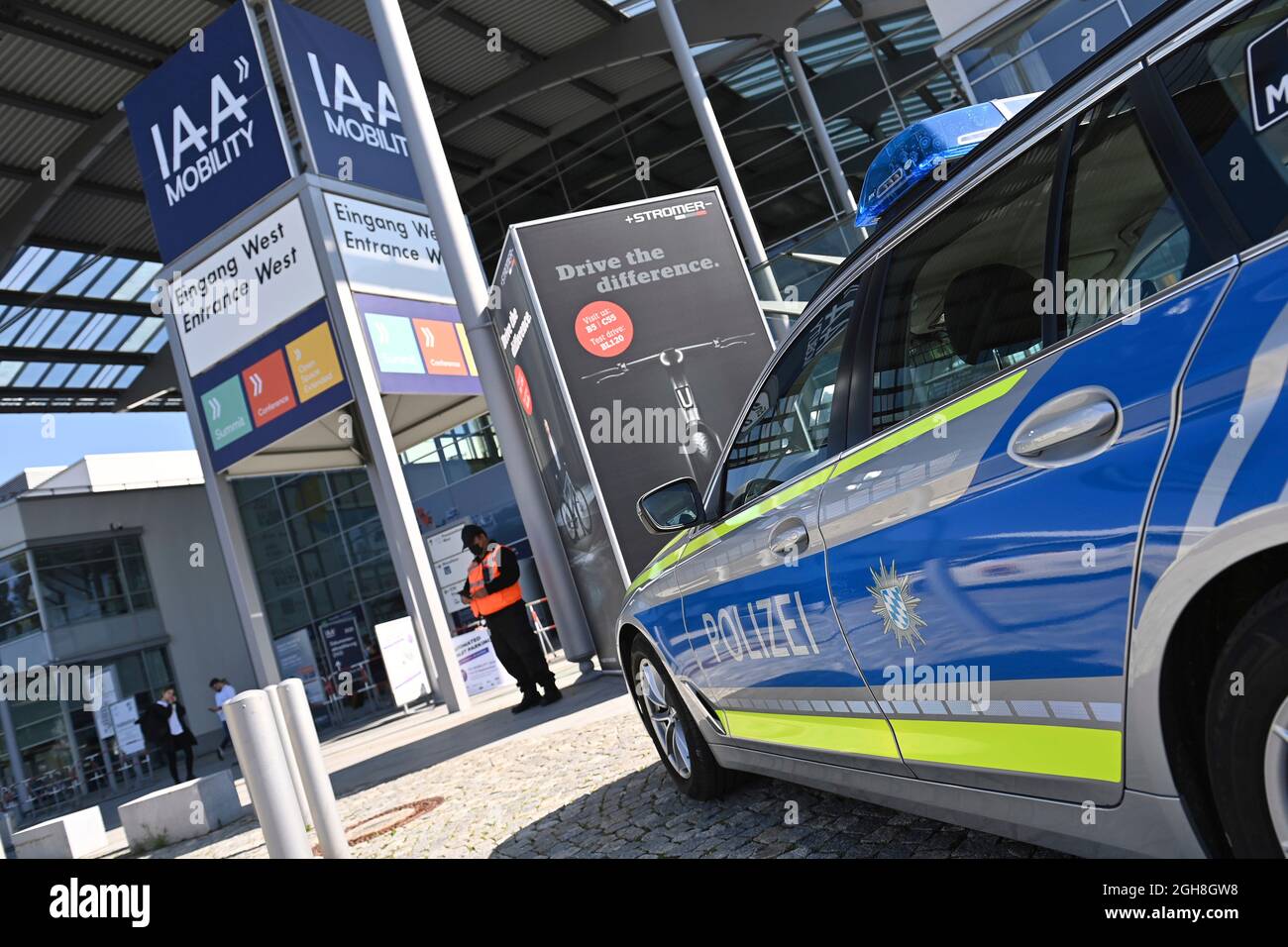 Police car in front of the West Entrance at Messe Muenchen Riem. Safety ...