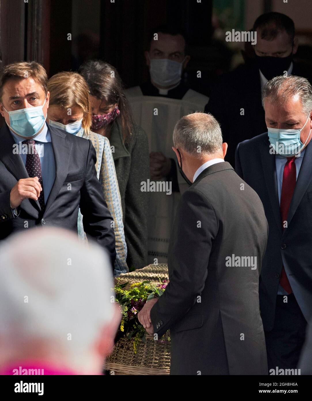 John Hume Jnr (left) and his brother Aidan (right) carry the coffin of ...