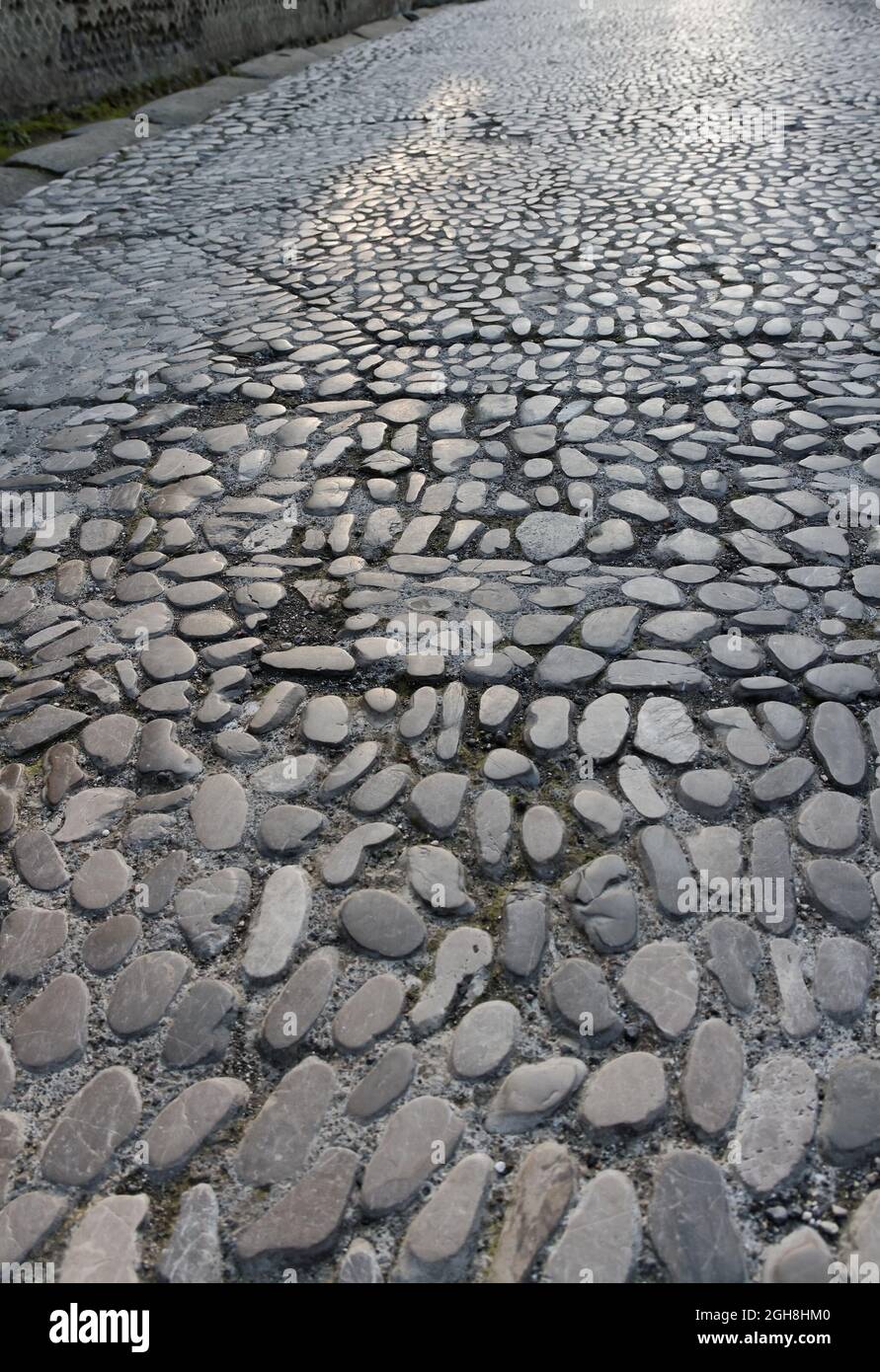 Surface of a flat road in Pompeii Stock Photo - Alamy