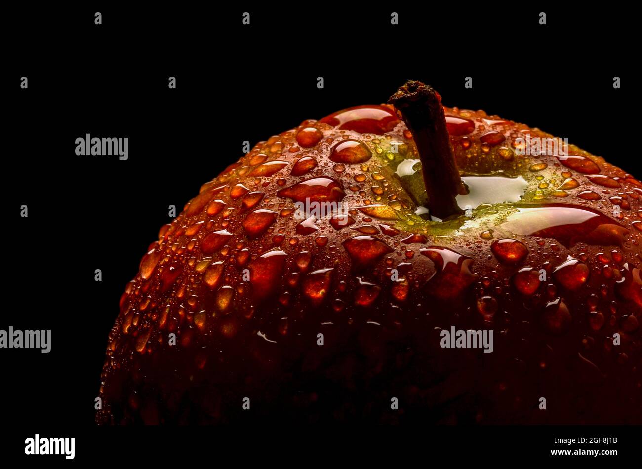 Apple with water droplets Stock Photo - Alamy