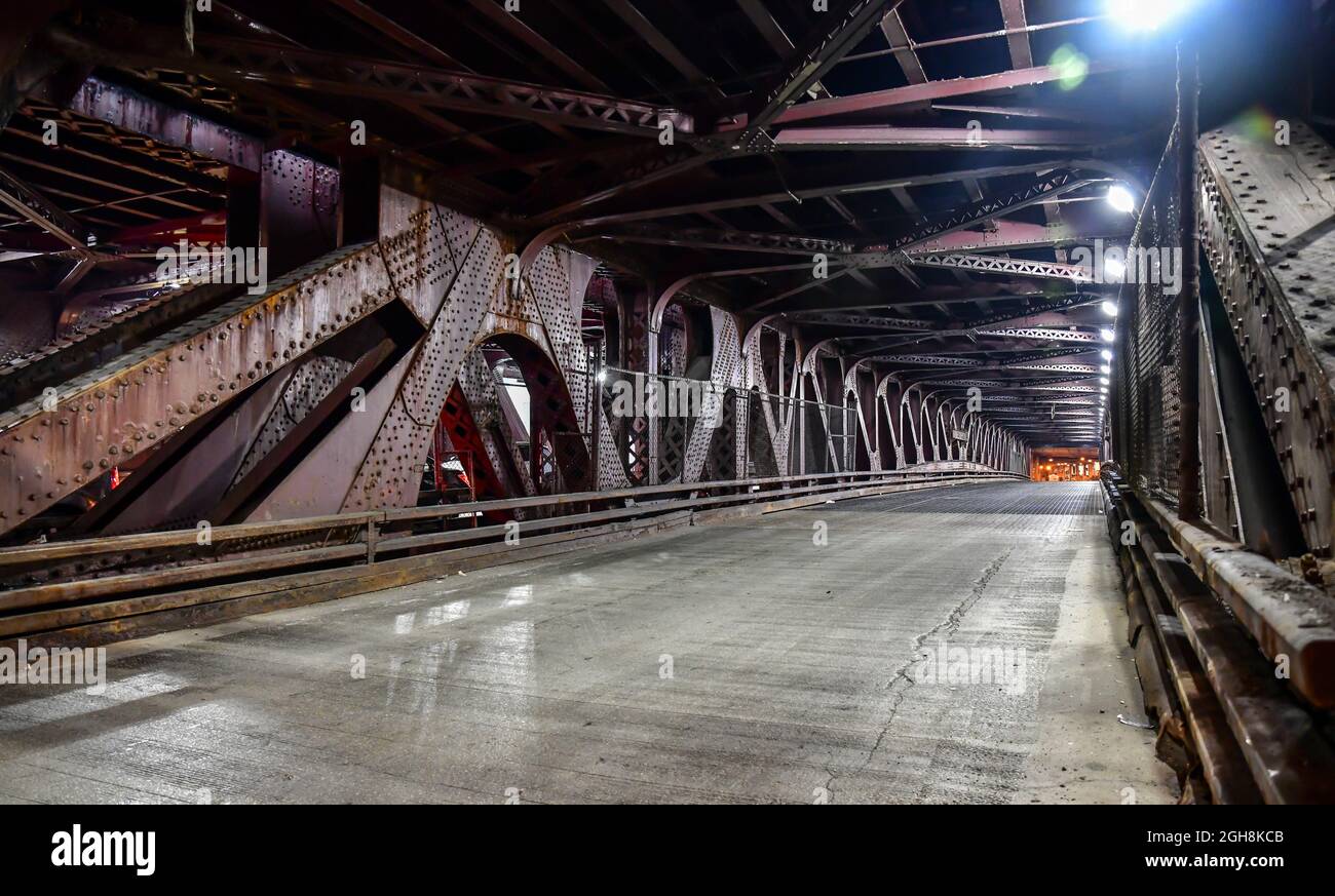 Empty vintage urban street and underground steel bridge Stock Photo - Alamy