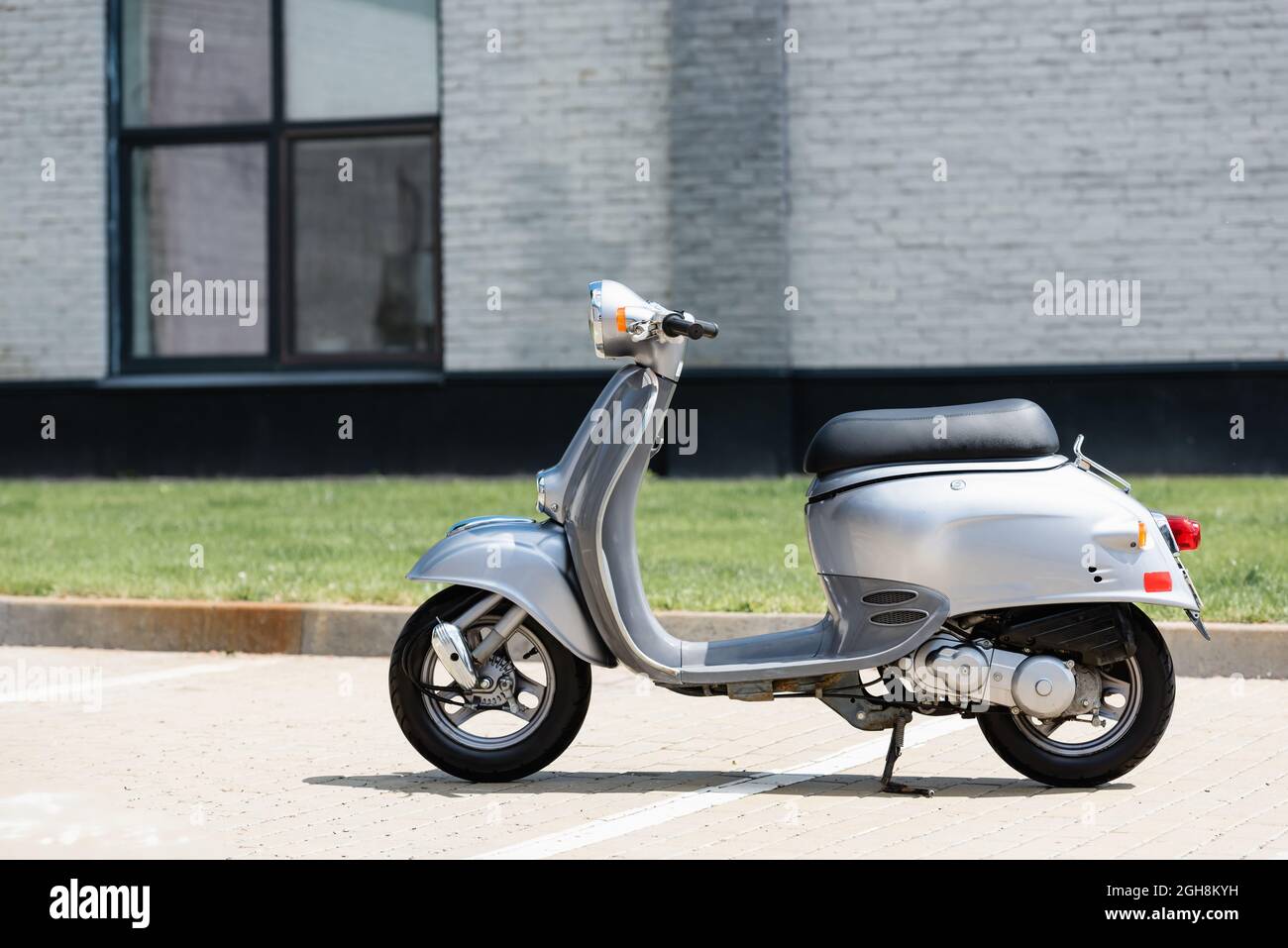 Grey scooter hi-res stock photography and images - Alamy