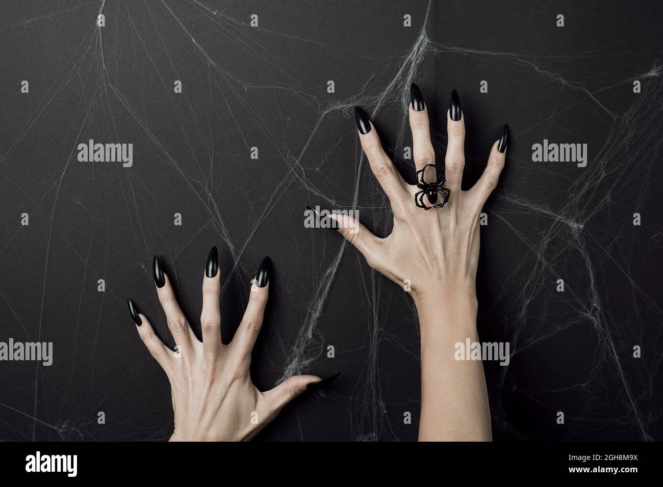 Long black nails hi-res stock photography and images - Alamy