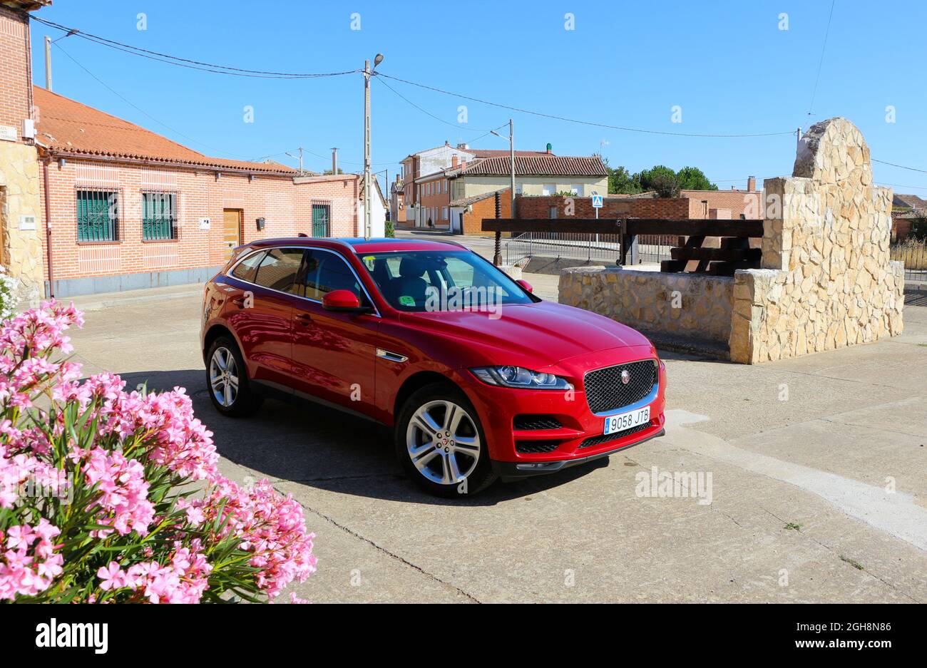 Photo of an Italian racing red Jaguar F-Pace 3.0D AWD car parked in a ...