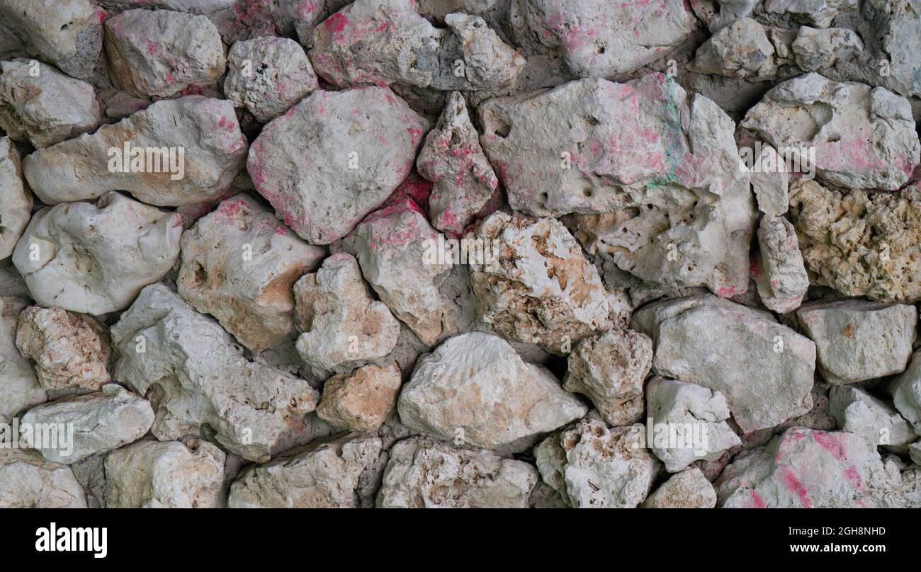 Closeup shot of gray stones with pink spots - for backgrounds and ...