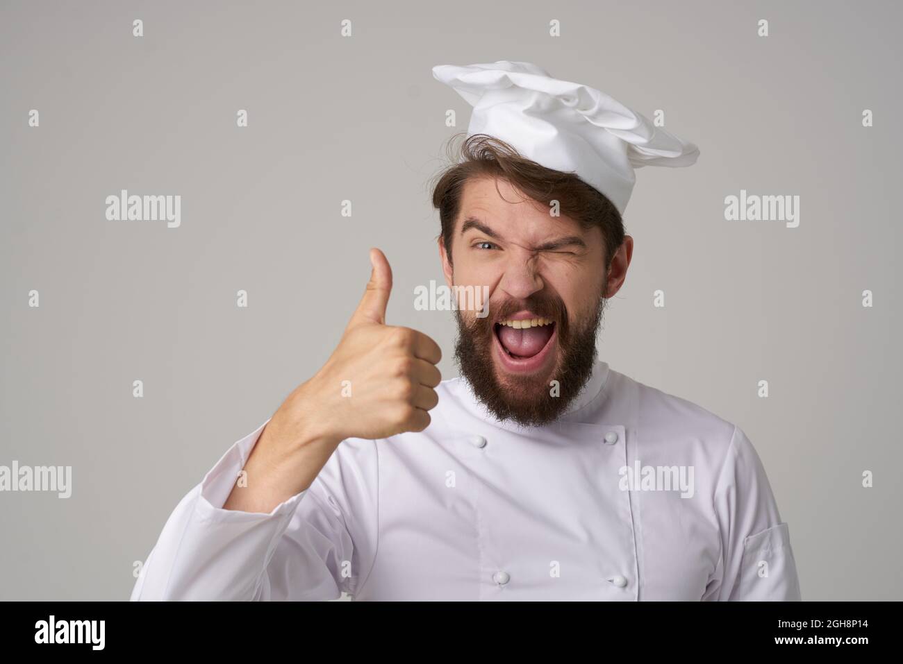 Man Chef uniform Cooking emotions isolated background Stock Photo - Alamy
