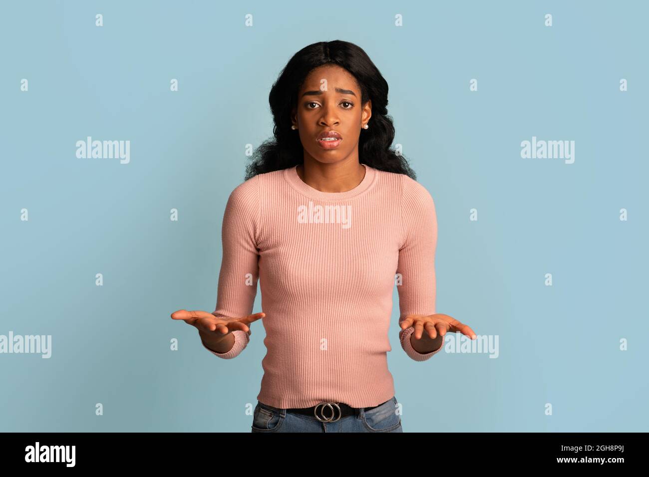 I Don't Know. Unsure Young Black Female Shrugging Shoulders And ...