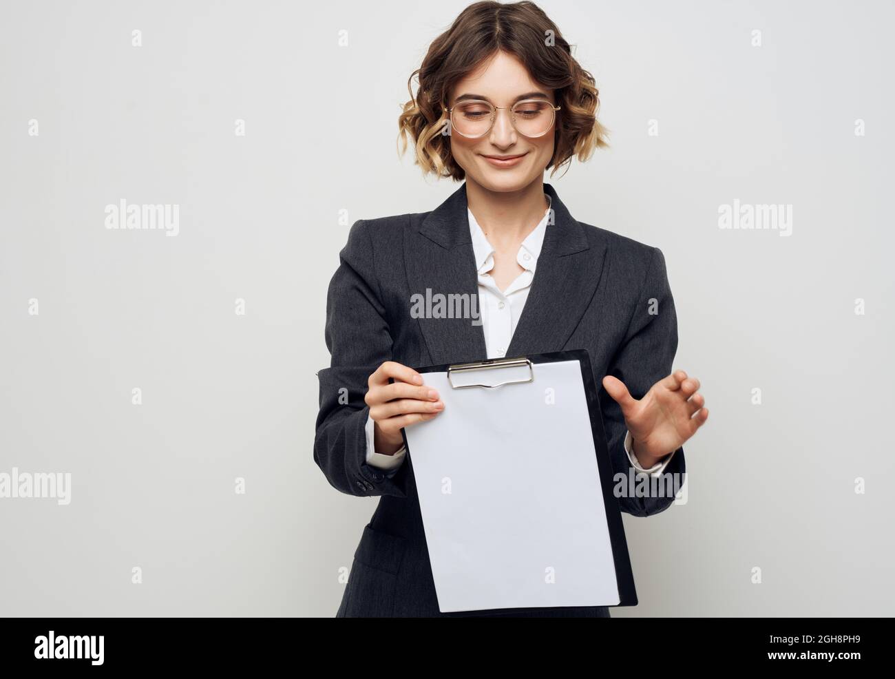 Business woman in suit folder for papers blank sheet Copy Space Stock ...
