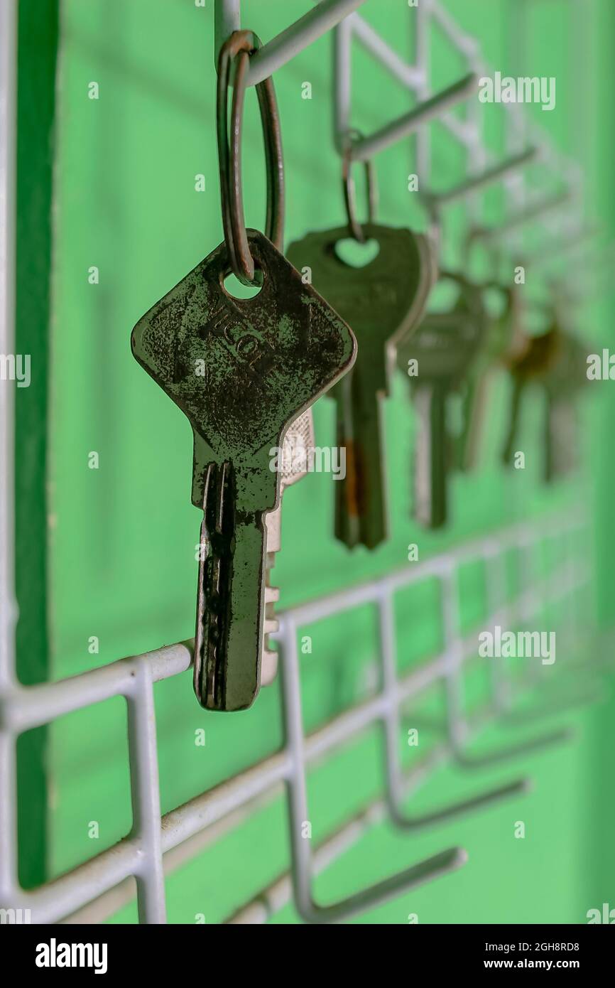 Locks lined up hanging on the wall Stock Photo - Alamy