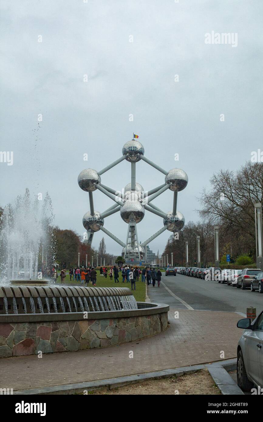 The Atomium structure in Brussels, Belgium with Asian tourists .The ...