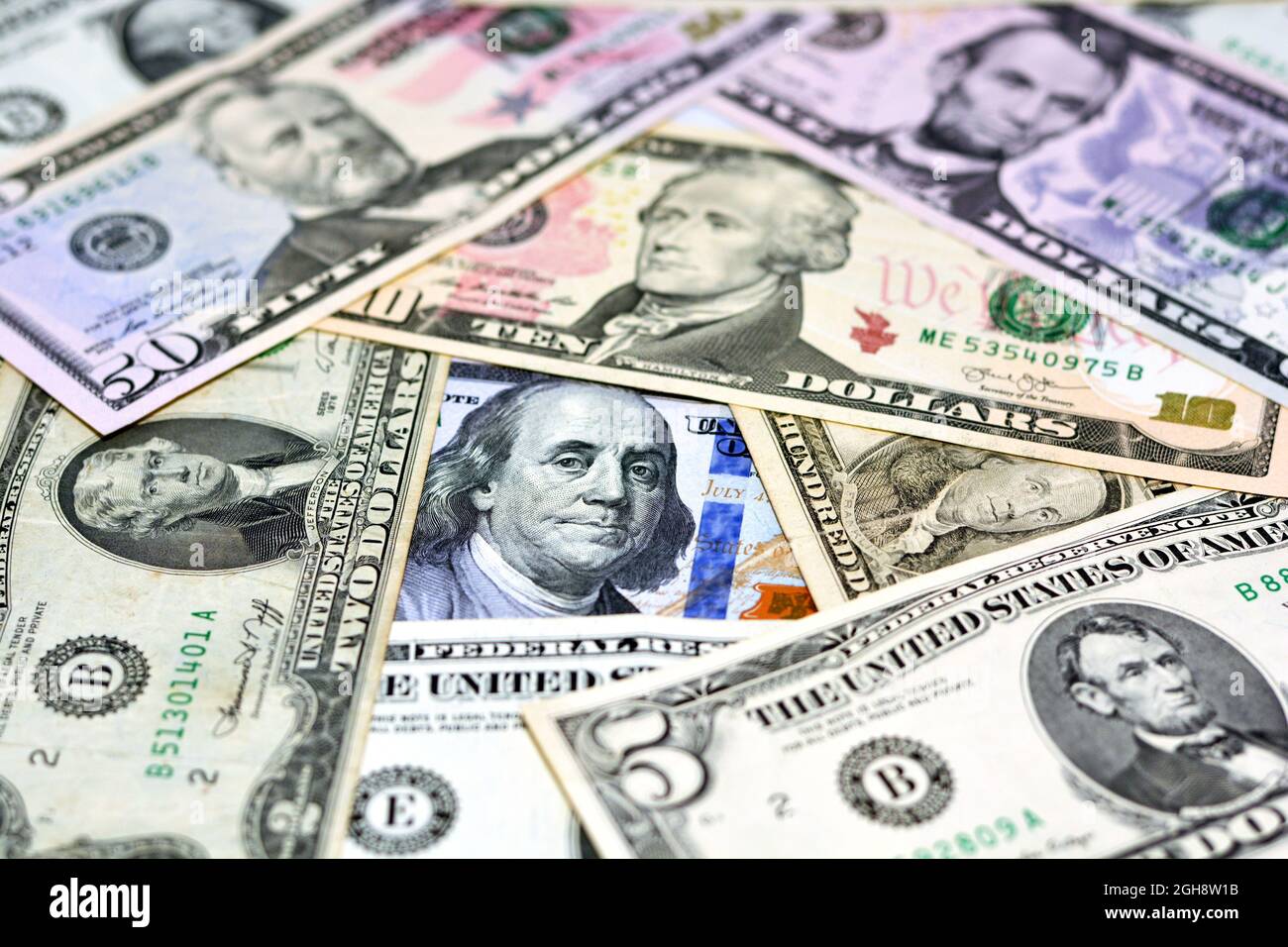 background of American money banknotes of different values and times ...