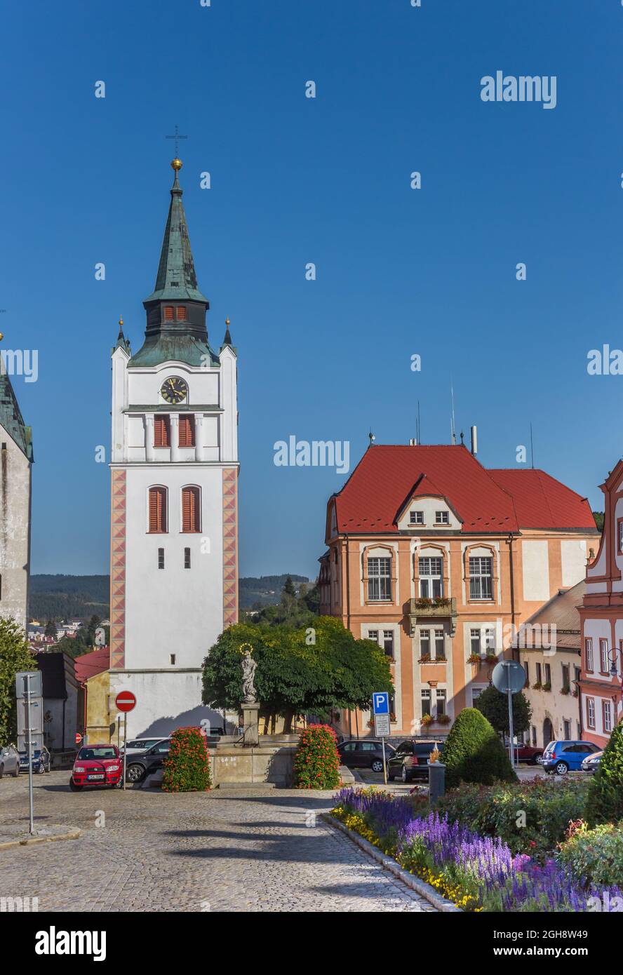 White church tower at the market square of Vimperk, Czech Republic ...
