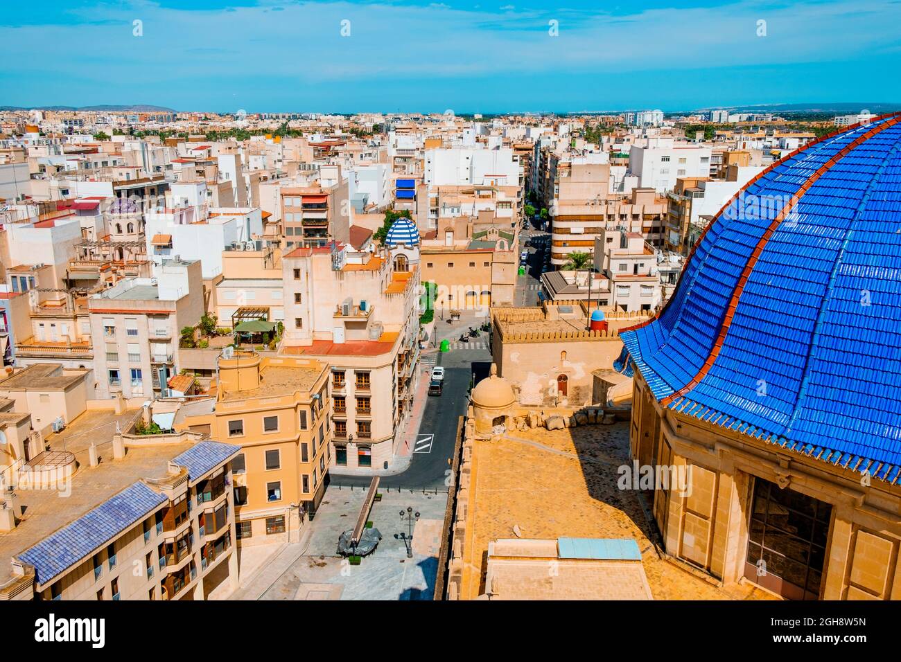 an aerial view of the old town of Elche, in Spain, highlighting the ...