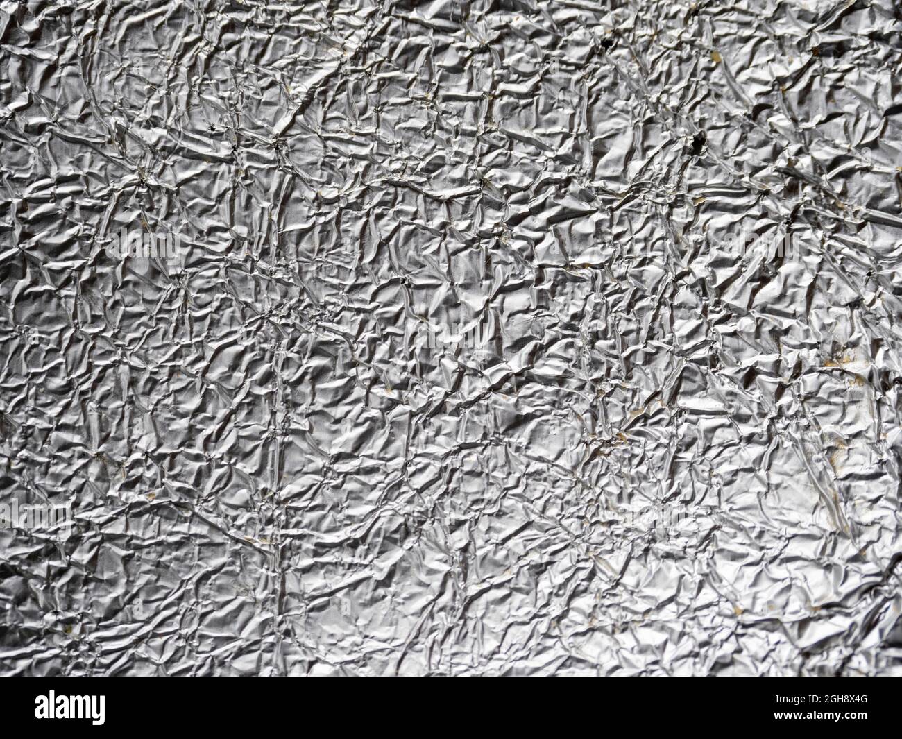 Patterns in crumpled up tin foil Stock Photo - Alamy