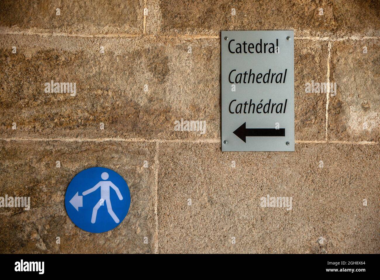 Signs of mandatory circulation through closed spaces Stock Photo - Alamy