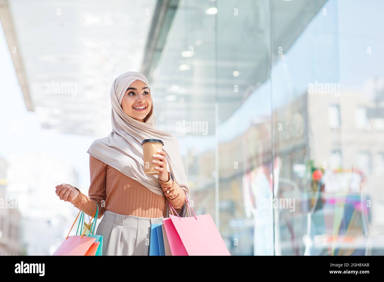 Inspired happy emotional cute millennial middle eastern lady in hijab ...