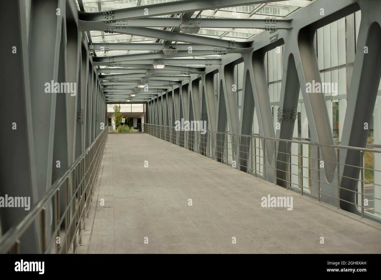 Modern industrial architecture. Bridge of steel beams. Pedestrian ...