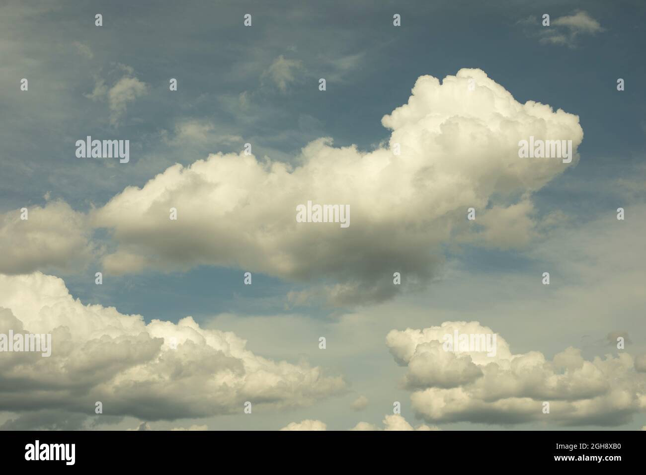 Clouds in the sky. Summer weather. Fluffy clouds in the summer ...