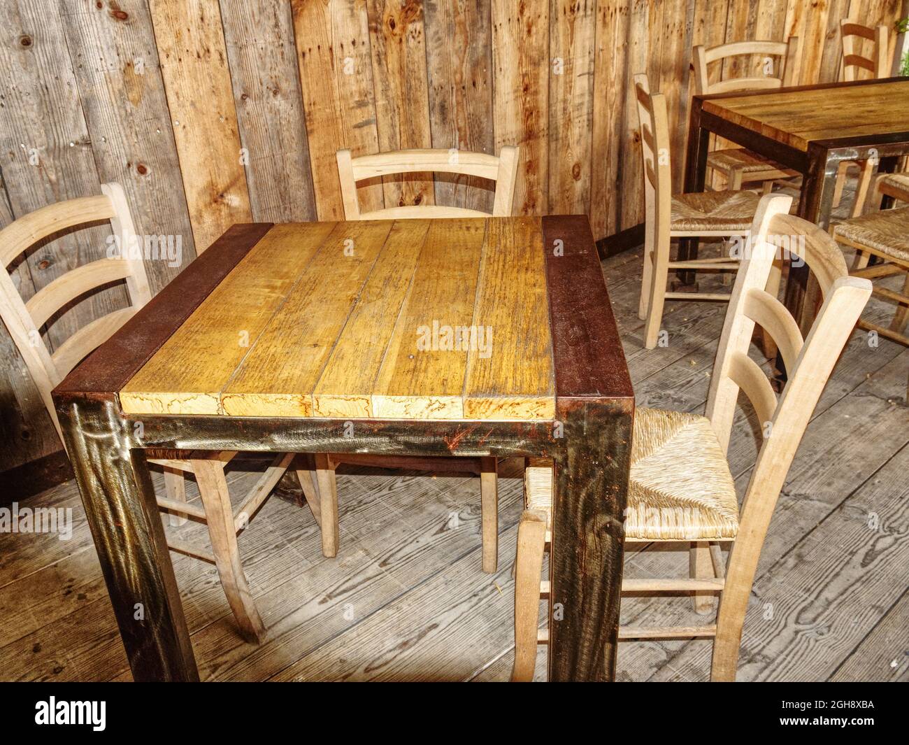 an industrial-style iron and wood table seen from above Stock Photo - Alamy