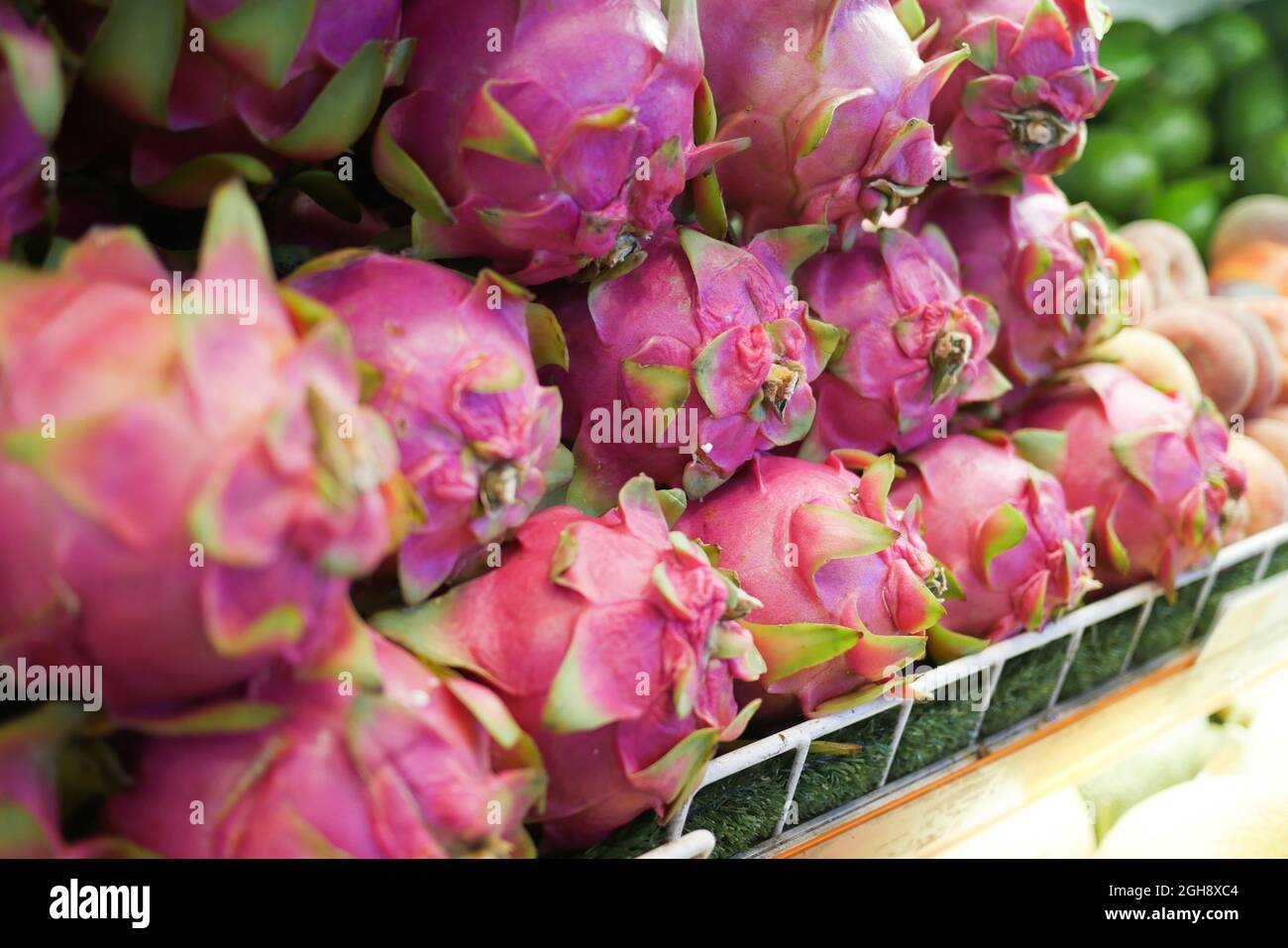 dragon fruit display for sale at local store Stock Photo - Alamy