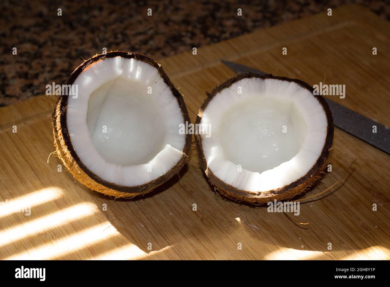 Freshly opened delicious coconut Stock Photo - Alamy
