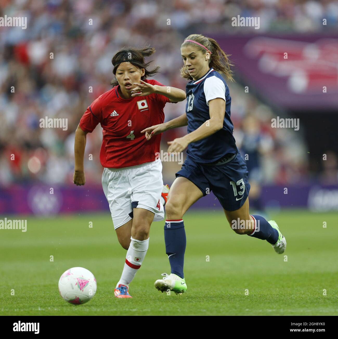 Usas Alex Morgan Tussles With Japans Saki Kumagai During The Womens