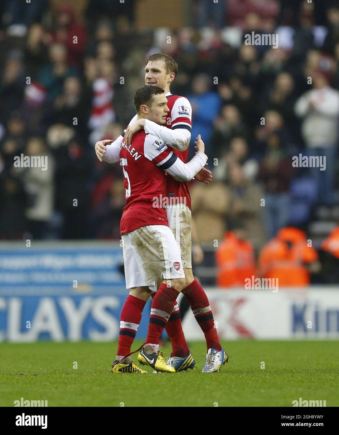 Arsenal's Per Mertesacker celebrates with Thomas Vermaelen at the final ...