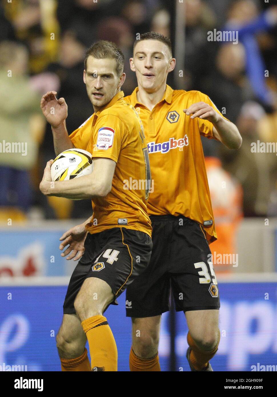 Roger Johnson of Wolves celebrates his goal with Jake Cassidy during ...