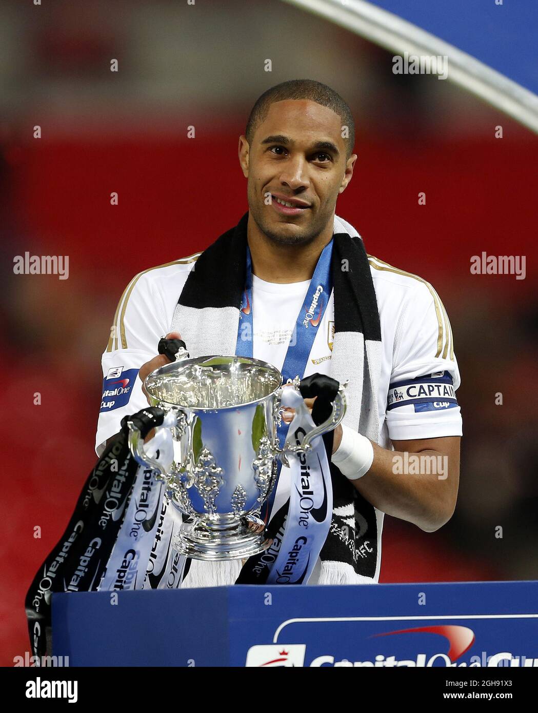 Swansea's Ashley Williams with the trophy after the Capital One Cup ...